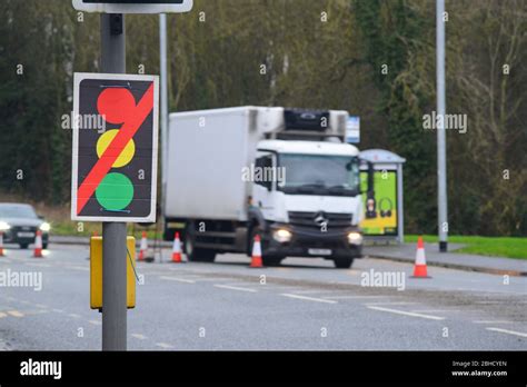 Lorry Passing Warning Sign Of Broken Traffic Lights At Road Junction