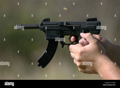 Tec 22 Semi Automatic Pistol An Assault Weapon With Shell Ejecting As