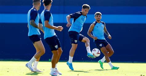 Entrenamiento Málaga CF Luismi Sánchez se ejercita al margen de sus