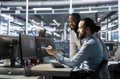 Team Of Programmers Using Computer In Data Center Integrating Ai Tools