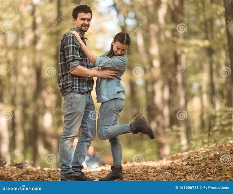A Young Couple Walking In The Autumn Forest Stock Image Image Of
