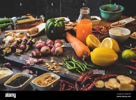 Healthy Food Herbs Spices For Use As Cooking Ingredients On A Wooden