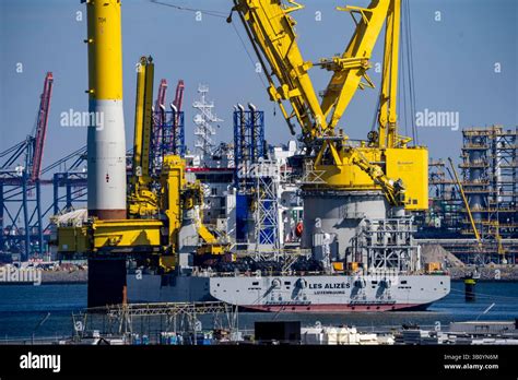 Assembly Of Monopiles The Foundations For Offshore Wind Turbines Here In The Port Of