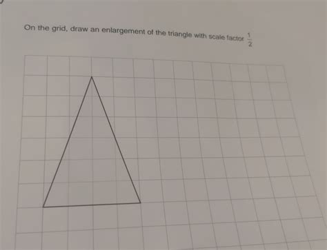 solved on the grid draw an enlargement of the triangle with scale