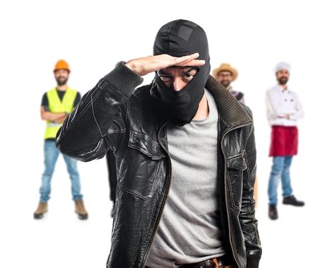 Premium Photo Robber Showing Something