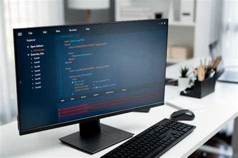 Premium Photo Program Coding Showing On Pc Monitor Standing On Desk