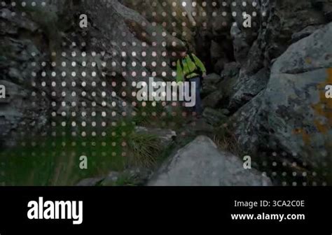 Man Hiking Down Rocky Pass Tracing Floating Route Line And Map Icons