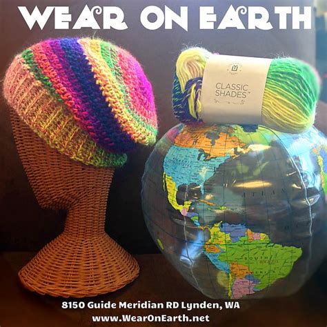 Two Knitted Hats Sitting On Top Of A Mannequins Head With The Words