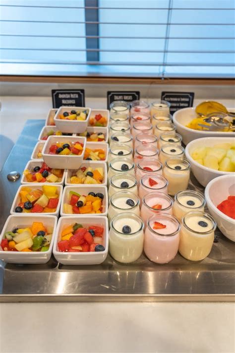 Colorful Mixed Fruits And Assorted Yogurt At Dessert Buffet Counter