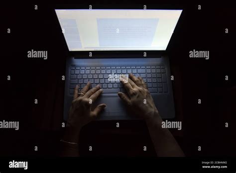 Person Typing Computer Dark Hi Res Stock Photography And Images Alamy