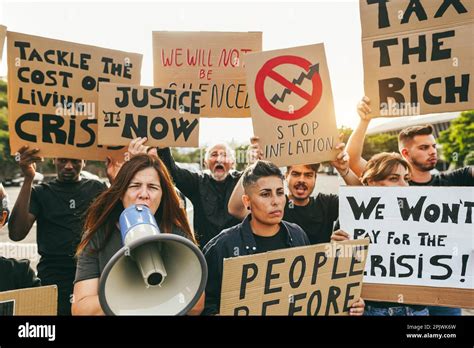 Crowd Of Multiracial People Protest Against Inflation And Financial