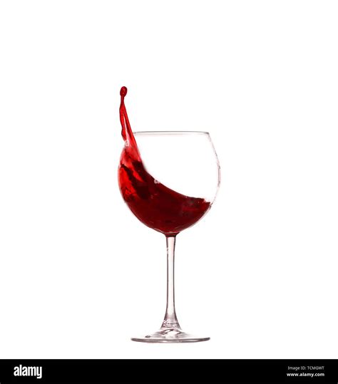 Red Wine Splashing From Glass Isolated On White Background Stock Photo