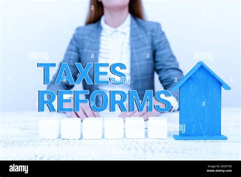 Sign Displaying Taxes Reforms Word Written On Managing Collected Taxes In A More Efficient