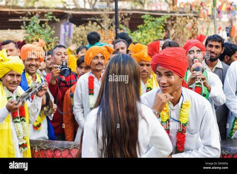 People In Traditional Rajasthani Dress Dancing At Surajkund Mela