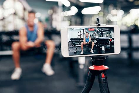 Gym Social Media And Fitness Influencer With Phone Live Streaming