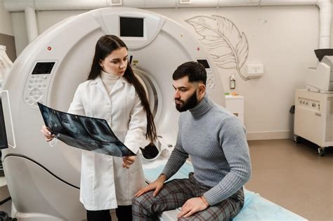 Premium Photo Ct Scan Radiologist Showing Xray Of Abdomen To Man