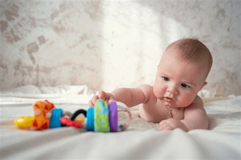 Baby Playing Rattle Sucking Thumb Royalty Free Images Stock Photos Pictures Shutterstock