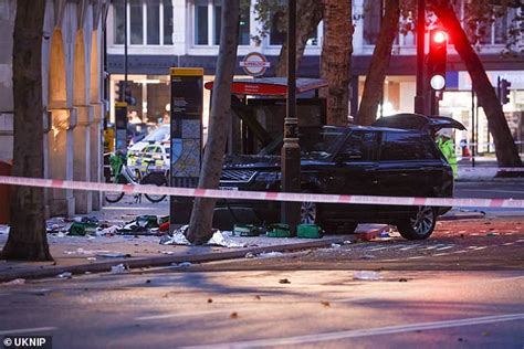 Horror As Range Rover Crashes Into London Bus Stop Leaving Nine Wounded
