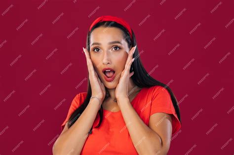 Premium Photo Portrait Of A Shocked Woman With An Open Mouth Looking