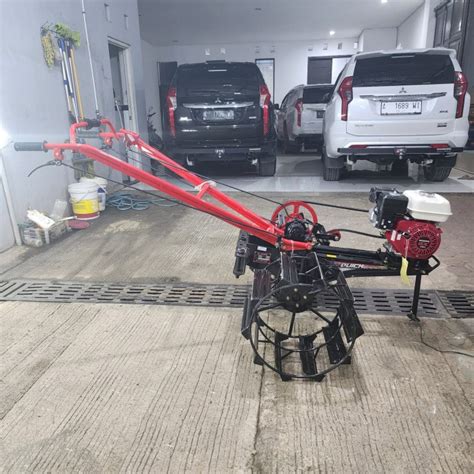 Jual TRAKTOR BAJAK SAWAH QUICK CAPUNG METAL MESIN HONDA GX 200 BARU