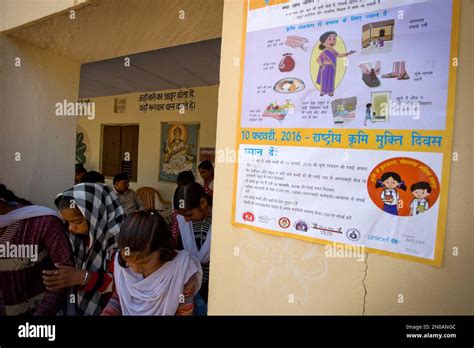 Posters About Worms In The Body Are Posted On The Wall During Deworming