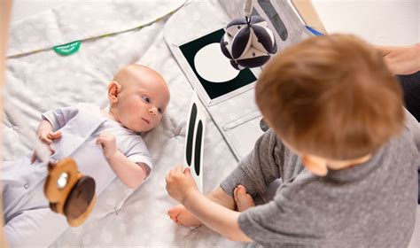 Tips For Navigating The Addition Of A New Sibling Lovevery