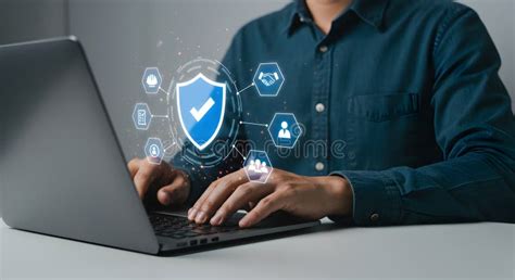 Cybersecurity Concept Of Business Man Using Laptop With Data Protection And Privacy Shield Icon