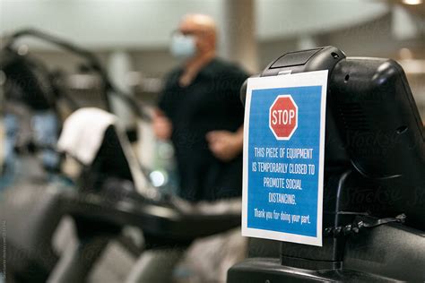 Gym Sign On Treadmill To Promote Social Distancing By Stocksy Contributor Sean Locke Stocksy