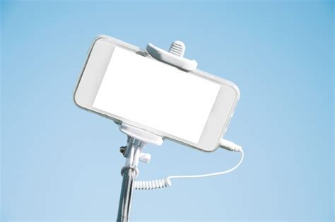 Selfie 스틱 근접 촬영에 스마트 폰 무료 사진