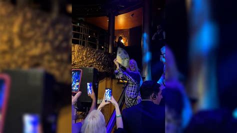 Watch Kylie Minogue Fans Herself In London Heat As She Kicks Off