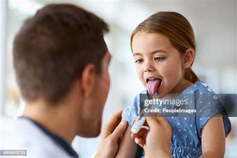 Girl Tongue Doctor Photos And Premium High Res Pictures Getty Images