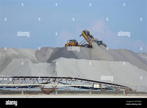 Dump Truck Unloading Salt At A Salt Mine For Salt Extraction Salt