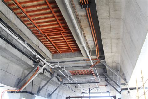 Timber Falsework Covers The Void Where Escalators And Lifts Will Serve