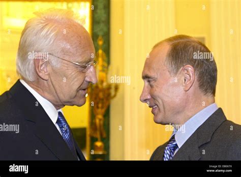 Bavarian Prime Minister Edmund Stoiber (L) is welcomed by Russian ...