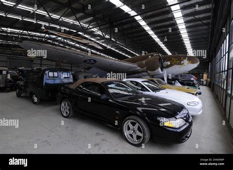 A Collection Of Cars And A World War 11 American Lockheed Lobster