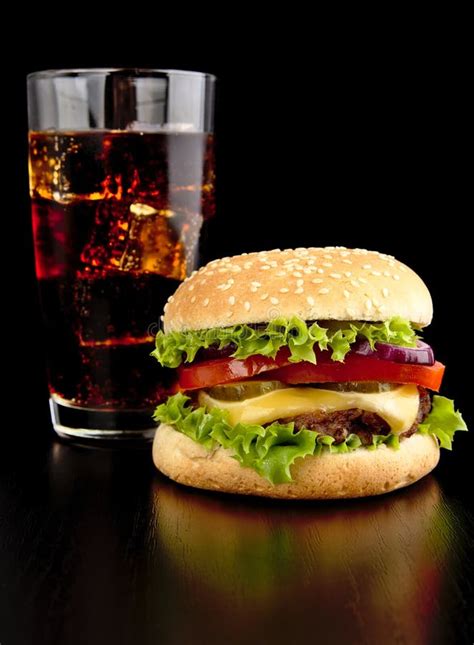 Big Cheeseburger With Glass Of Cola And French Fries Isolated On Stock