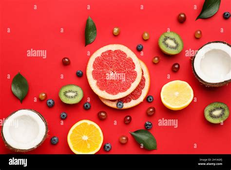 Composition With Different Fruits And Berries On Color Background Stock