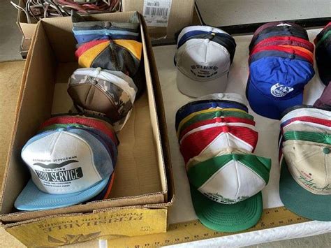 Box With Assorted Caps Legacy Auction Company