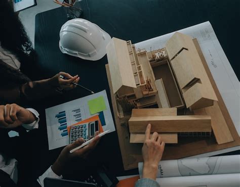 Premium Photo Engineer Teamwork Meeting Drawing Working On Blueprint Meeting For Project