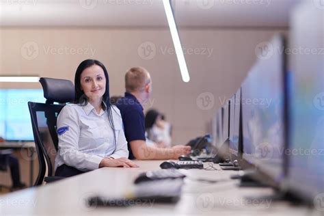 Female Operator Working In A Security Data System Control Room 10701996 Stock Photo At Vecteezy