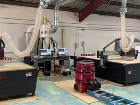 Check Out These Two Boss Cnc Routers Running At Equinox Cabinets In