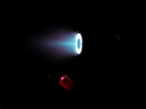A Laboratory Hall Effect Thruster Ion Thruster Firing In A Vacuum