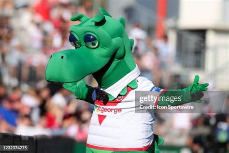 Dragons Mascot Photos And Premium High Res Pictures Getty Images