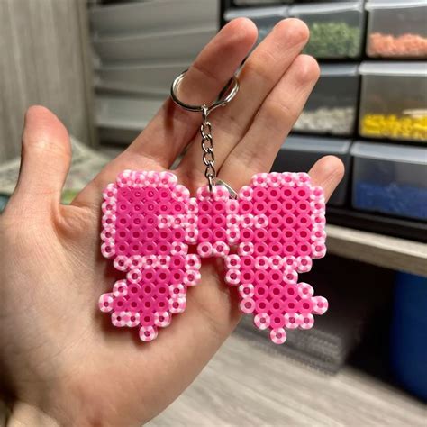 Perler Bead Pink Swirl Bow 🎀 In 2025 Diy Bow Perler Beads Diy Keychain