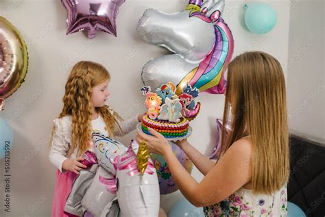 Happy Birthday Girl Holding A Cake Decorated Cake With Toppers My