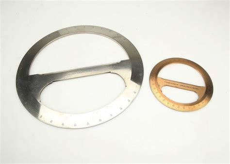 Lot 714 Two Circular Protractors