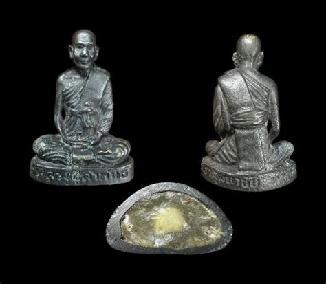 รูปหล่อหลวงปู่คำพันธ์ โฆสปัญโญ รุ่นปฐวีธาตุ ปี 36 เนื้อทองผสมรมดำ Ennxo