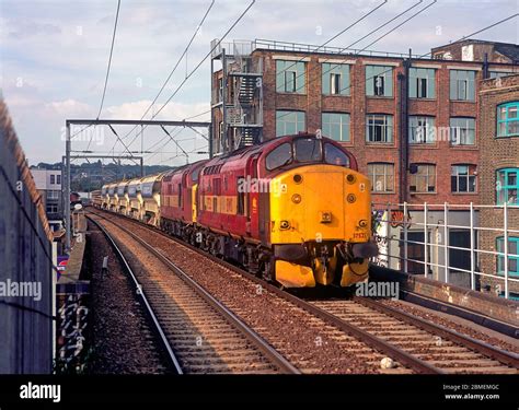 A Pair Of Class 37 Diesel Locomotives Numbers 37521 And 37109 Working A