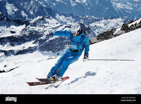 Male Skier Speeding Down Mountain Stock Photo Alamy