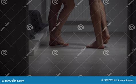 Slow Motion And Focus On The Legs And Feet Of Men And Women While